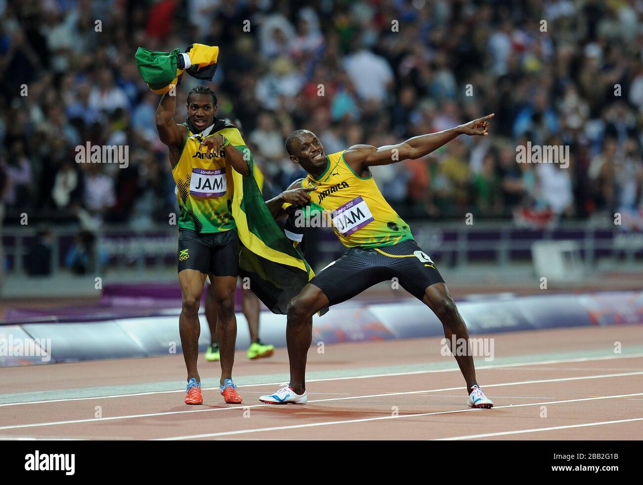 Jamaica's Usain Bolt and Yohan Blake (left) celebrate winning the Men's ...