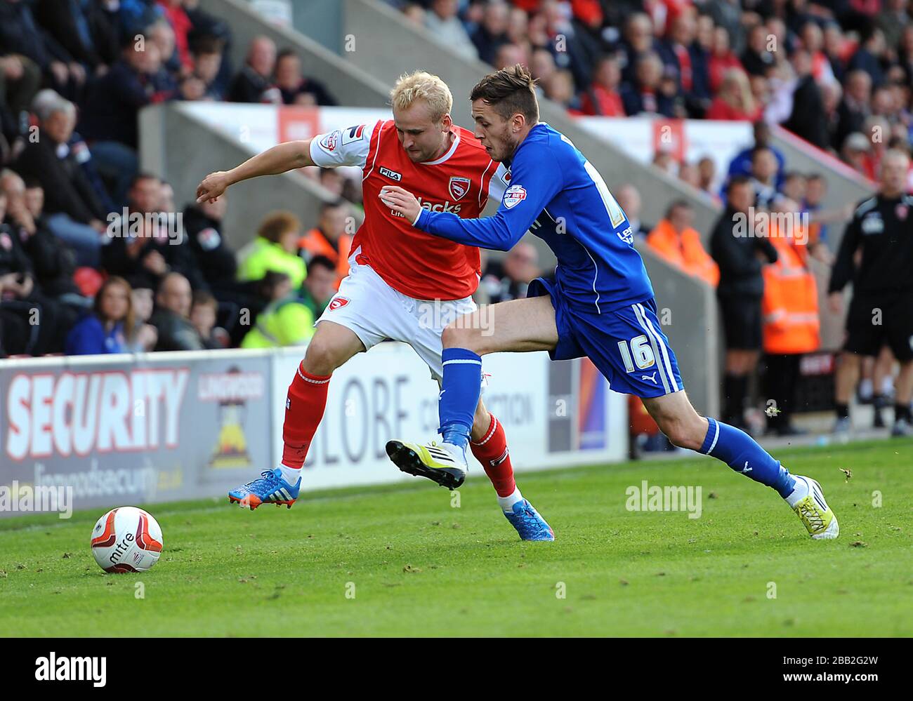 Morecambe's Robbie Threlfall (left) and Chesterfield's Jamie Devitt ...