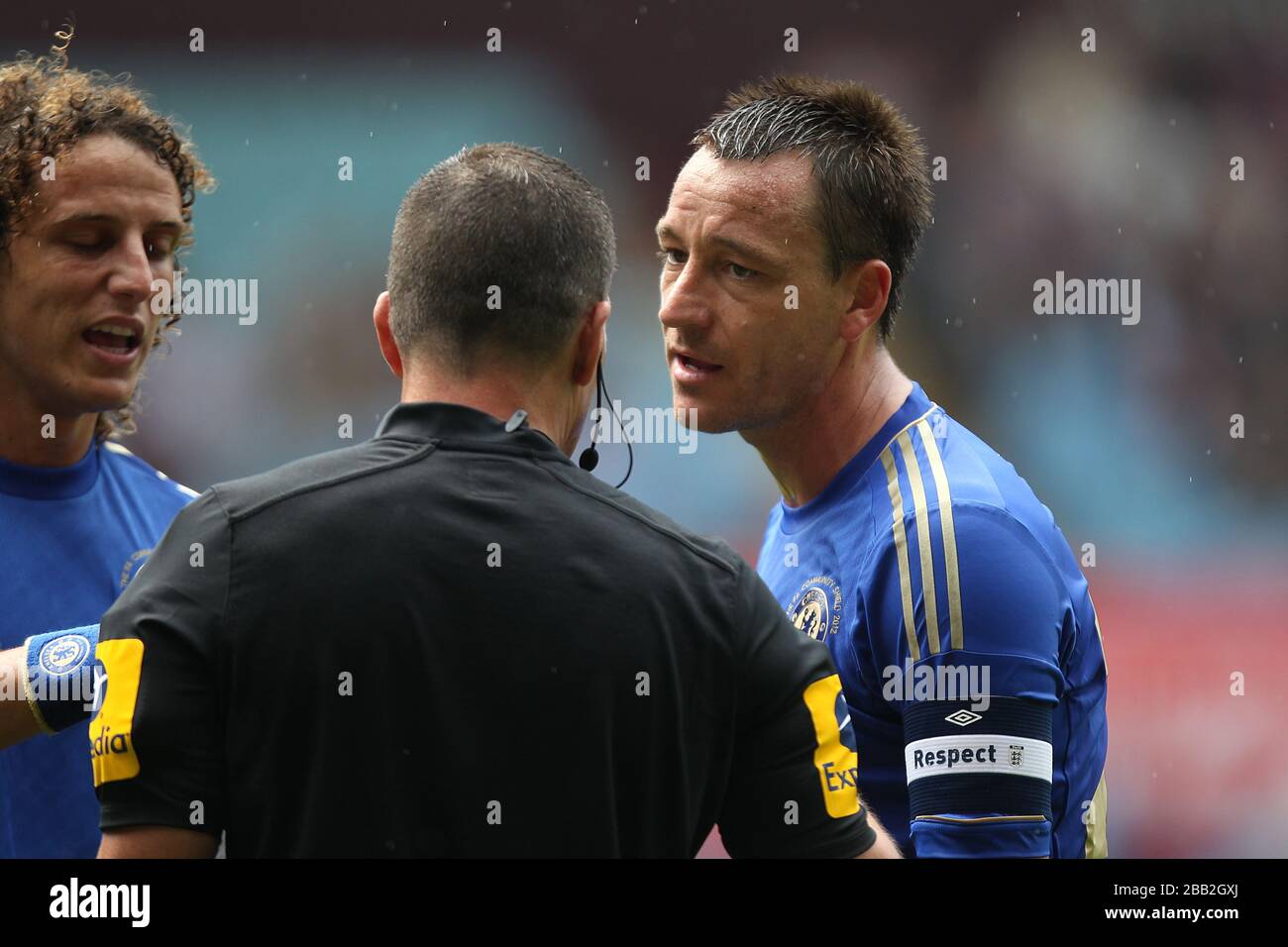 Chelsea's John Terry (right) has a word with referee Kevin Friend after ...