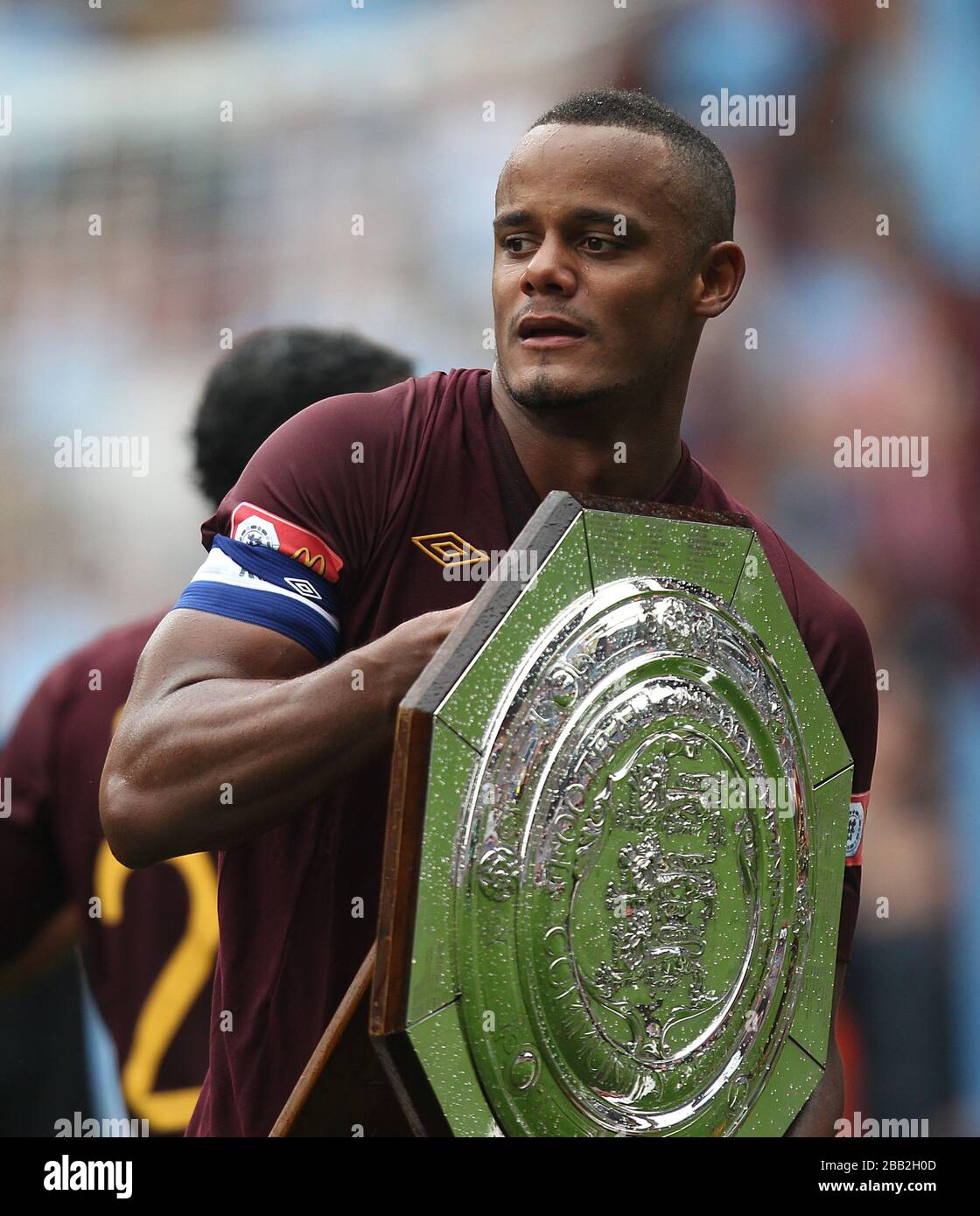 Manchester City captain Vincent Kompany celebrates with the FA ...