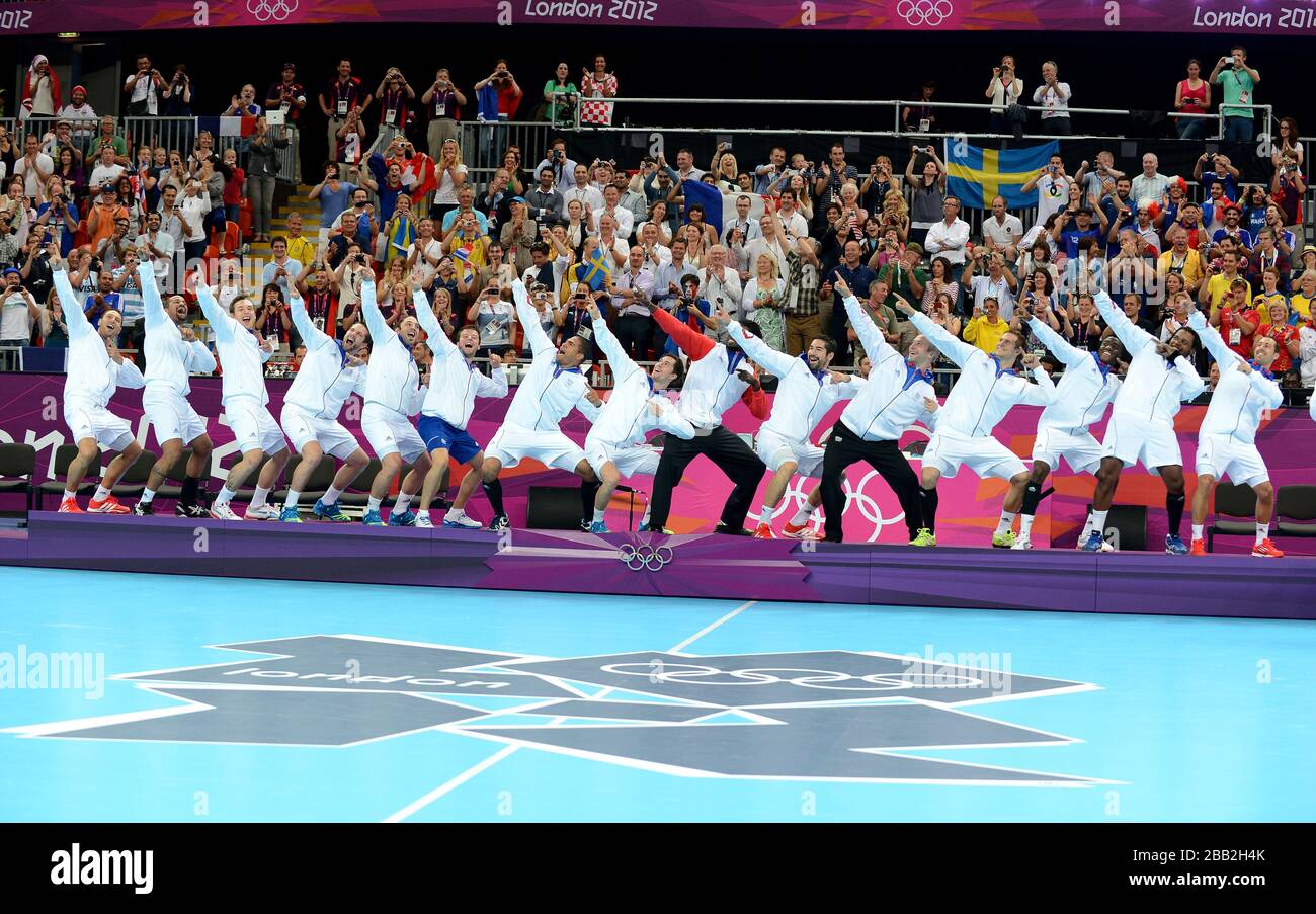 The French Handball team do a "Usain Bolt" celebration before the medal ...