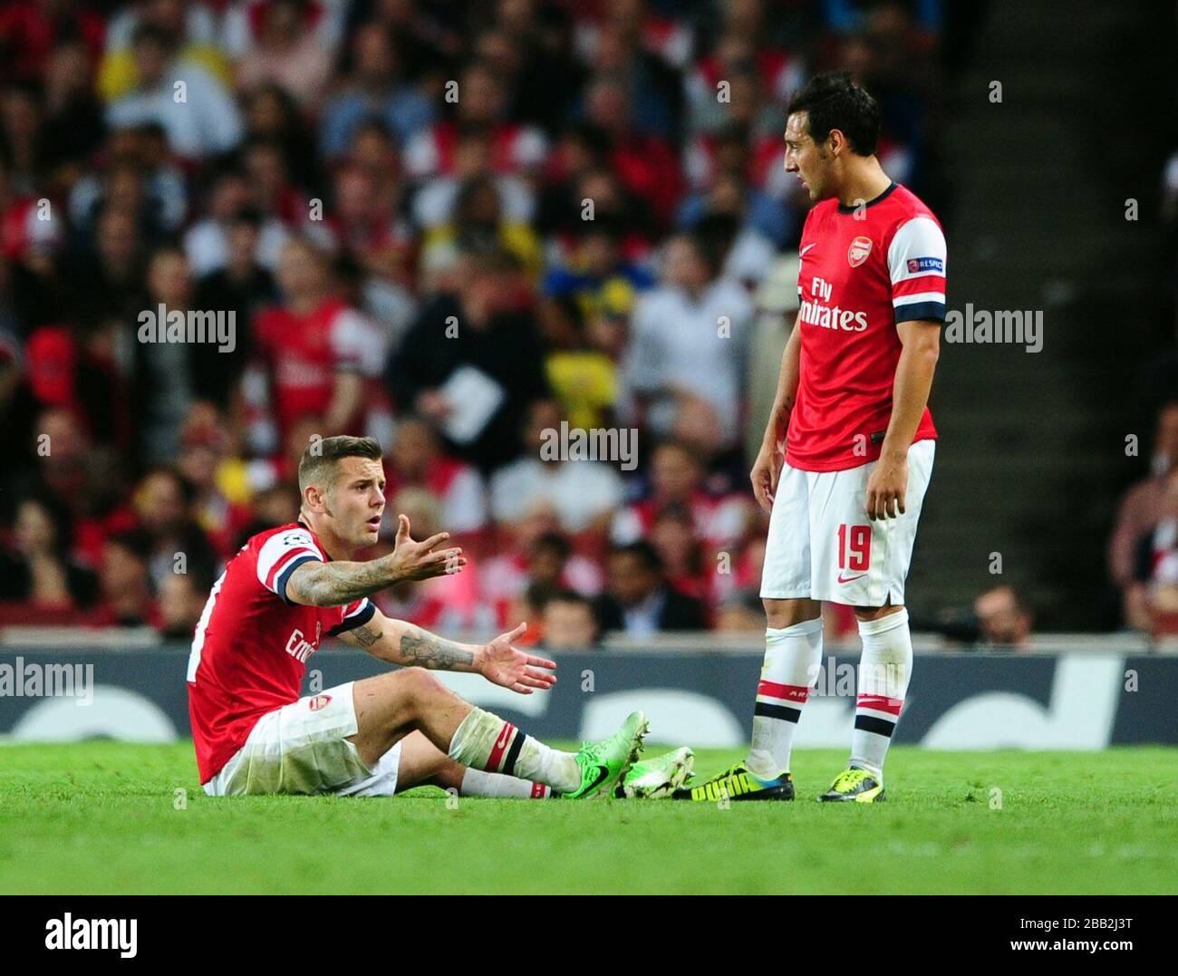 Arsenal's Jack Wilshere goes down with an injury during the game Stock ...