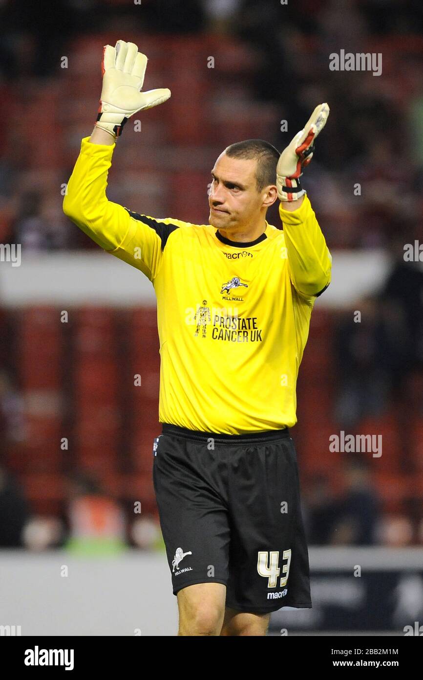 Millwall goalkeeper Stephen Bywater acknowledges the travelling support ...