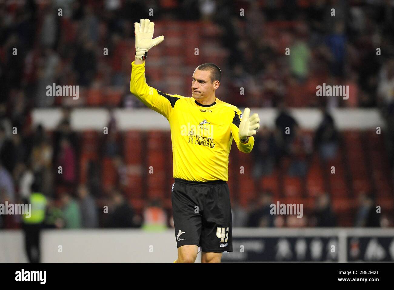 Millwall goalkeeper Stephen Bywater acknowledges the travelling support ...