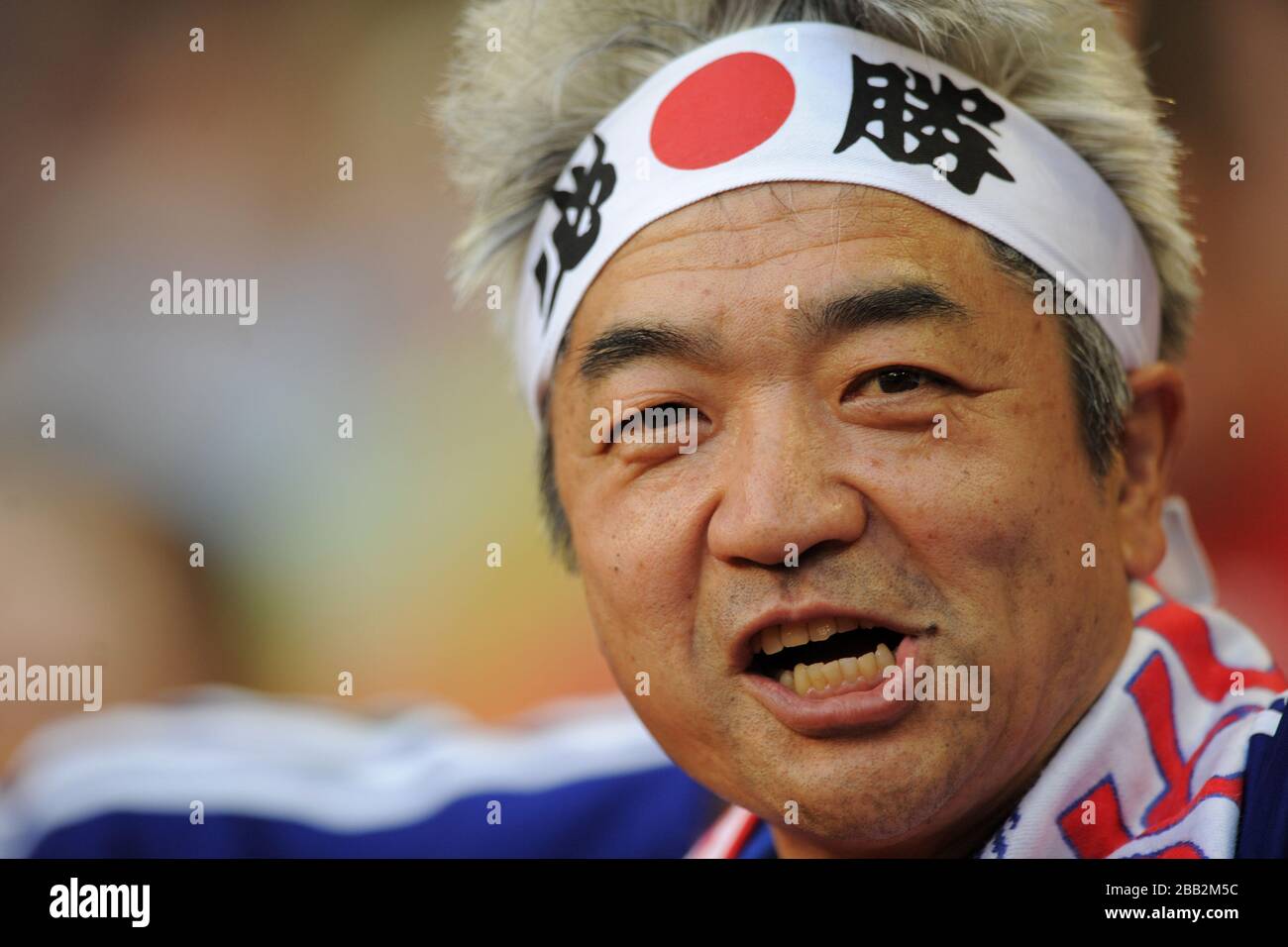 A Japan fan before the men's football Bronze medal match between Japan ...