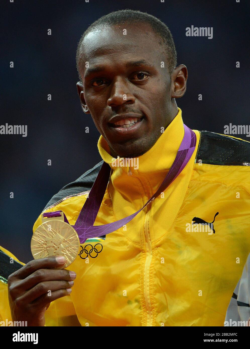 Usain Bolt receives his Men's 100 metres gold medal at the Olympic ...