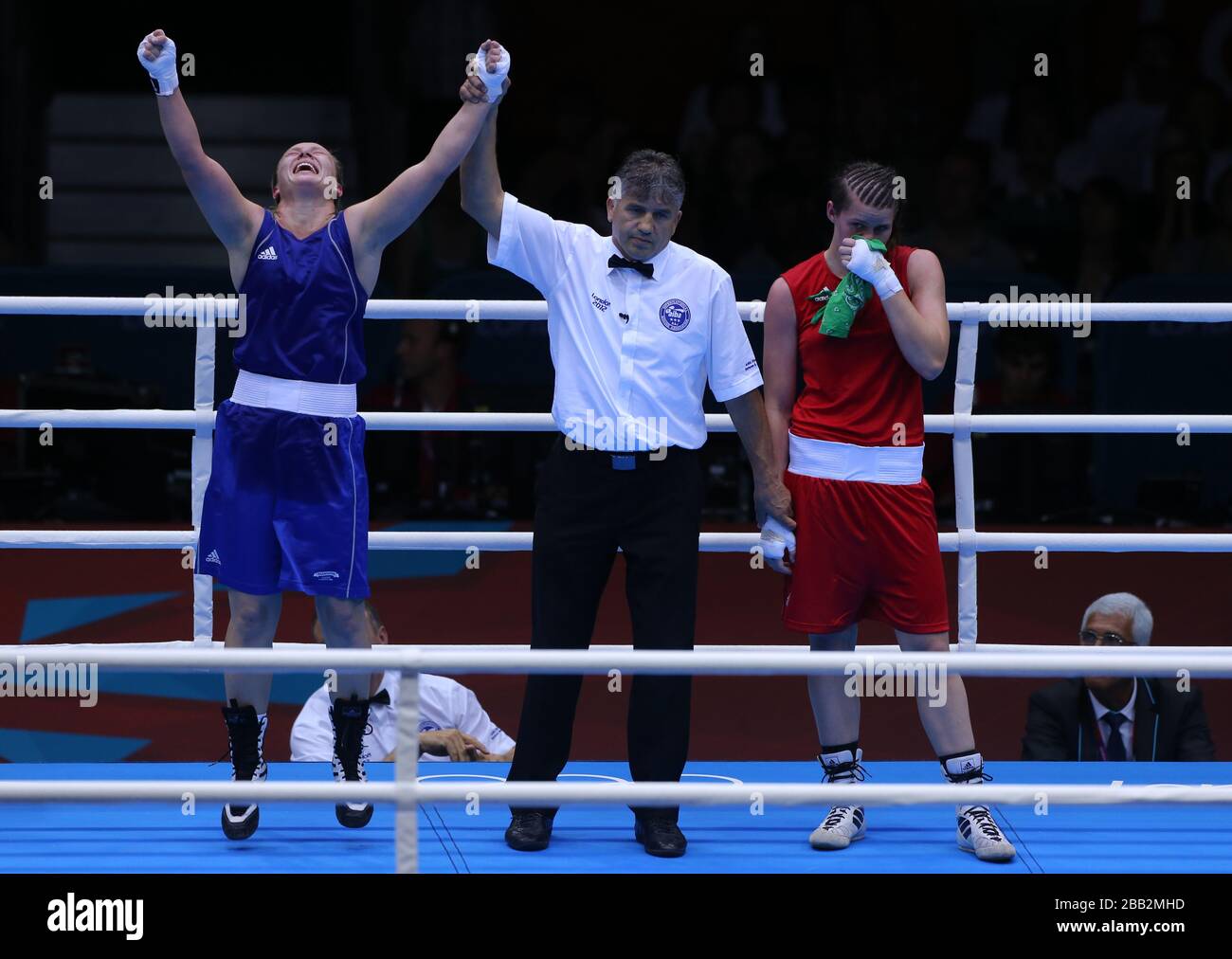 Great Britain's women boxer Savannah Marshall shows her dejection after ...