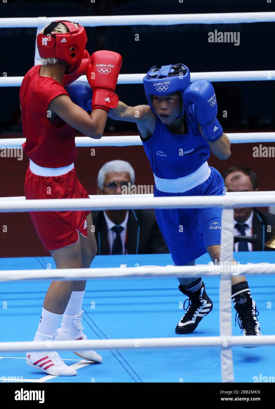 India's Women boxer Chungneijang Mery Kom Hmangte (blue) during her win ...