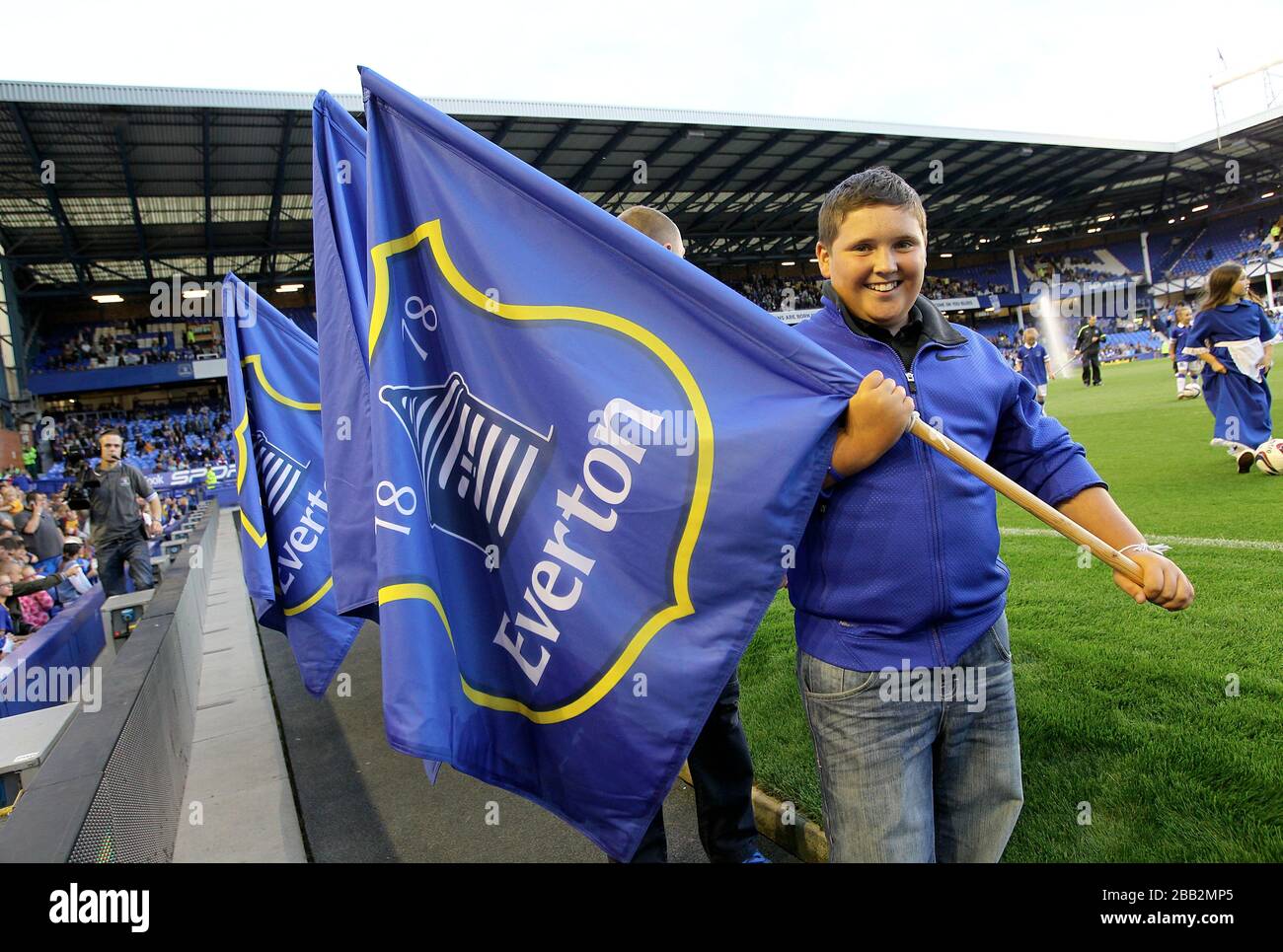 Everton flags paraded around the pitch Stock Photo - Alamy