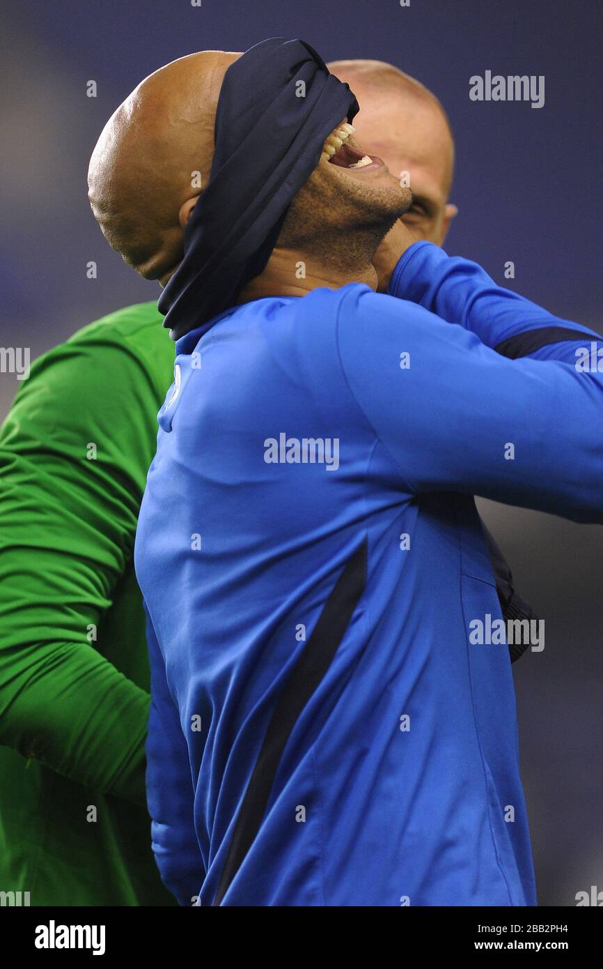 Everton goalkeeper Tim Howard jokes with Jan Mucha Stock Photo - Alamy
