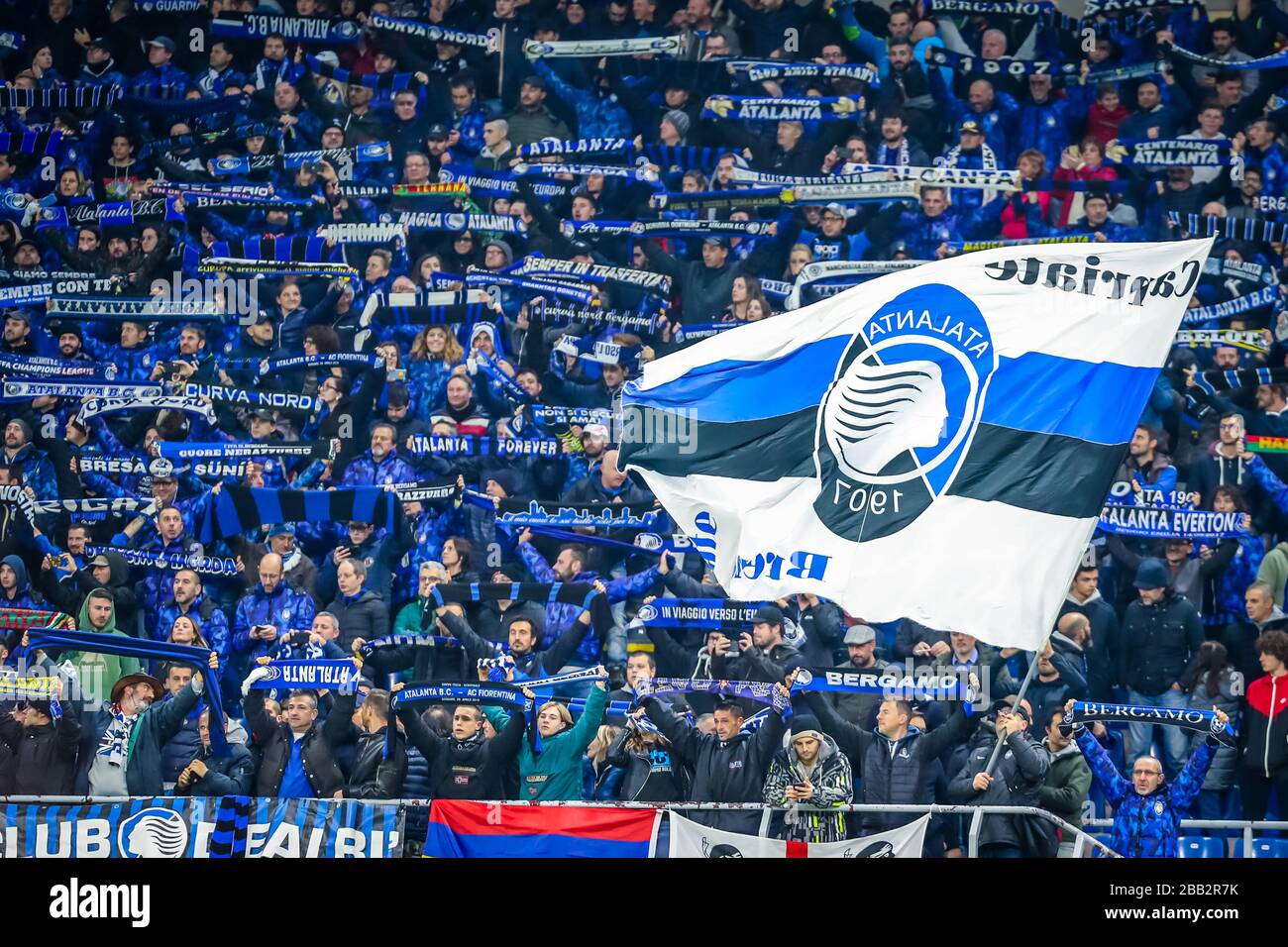 Atalanta BC supporters and flags during soccer season 2019/20 symbolic ...