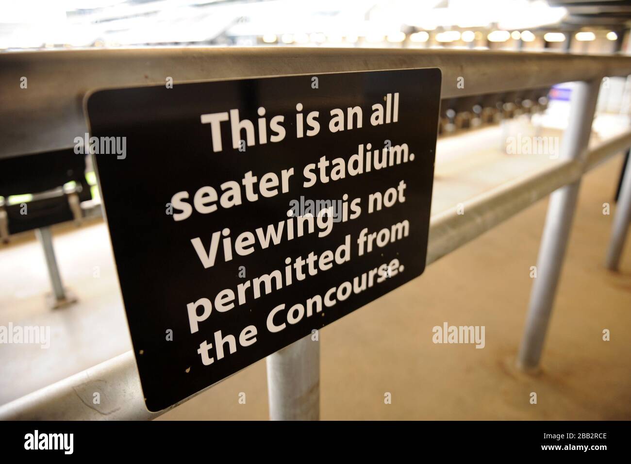 Signage on the concourse at the stadium:mk Stock Photo - Alamy