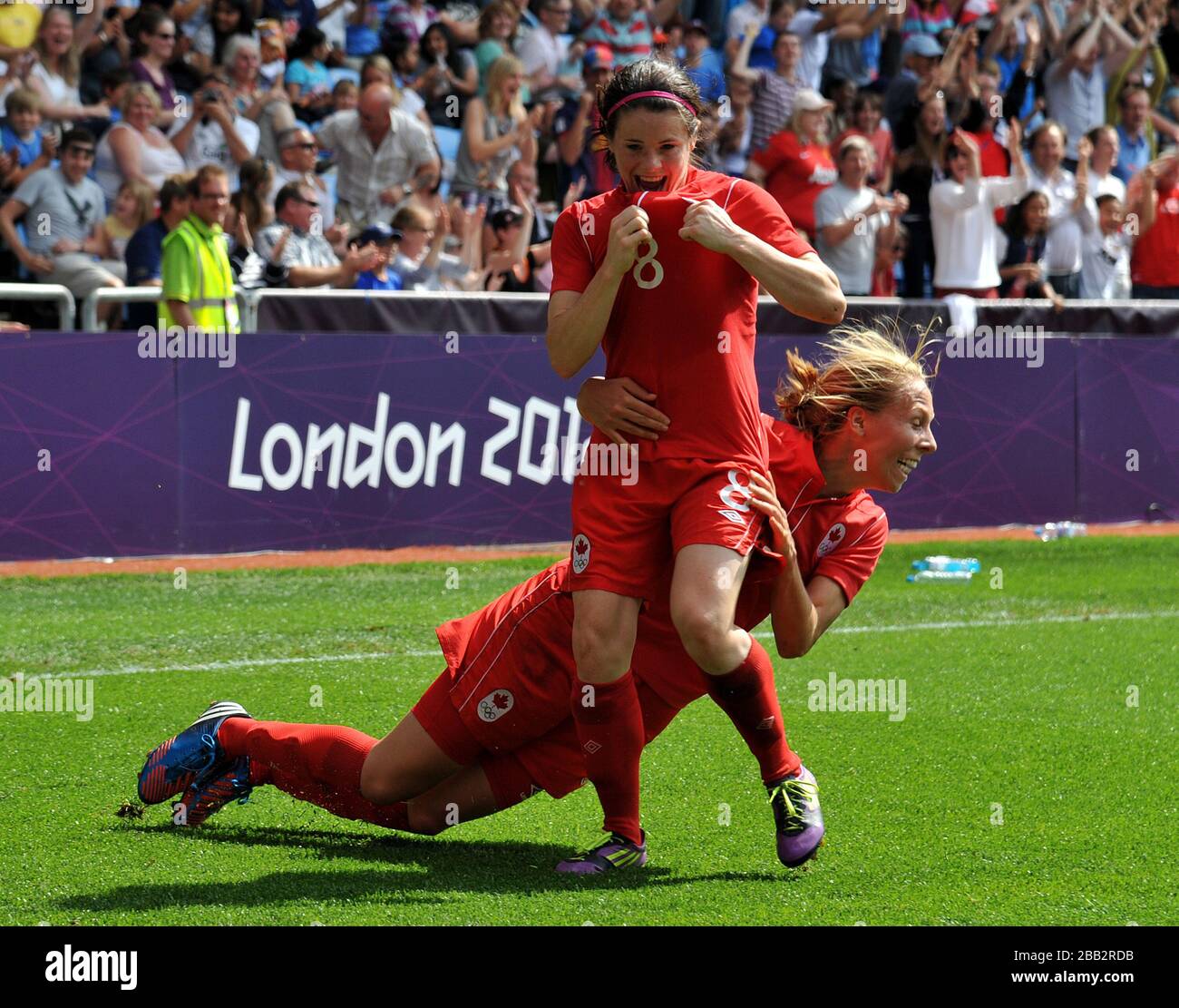 Canada's Diana Matheson is congratulated on scoring their winning goal ...