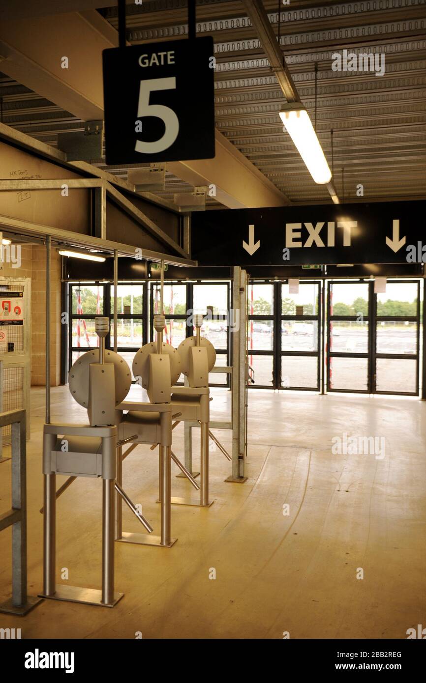 View of the ticket barriers inside the stadium:mk Stock Photo - Alamy