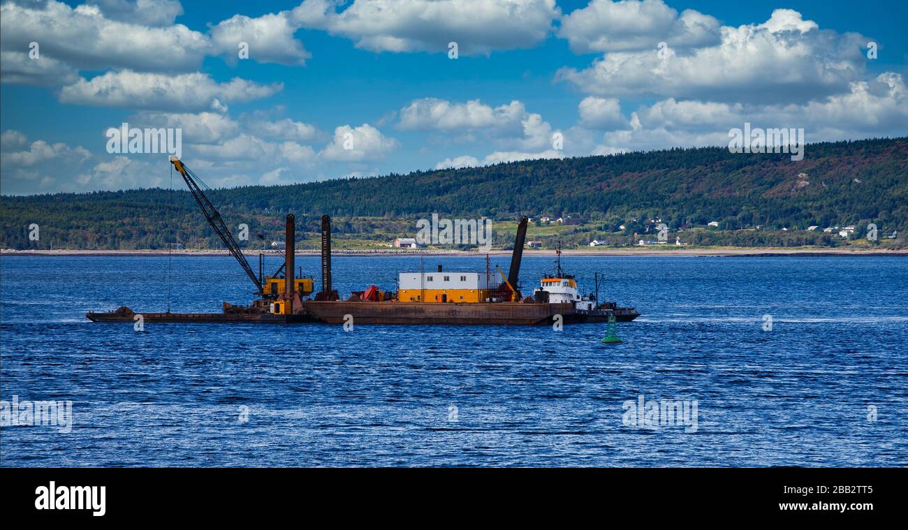 Working Barge on Canadian Channel Stock Photo - Alamy