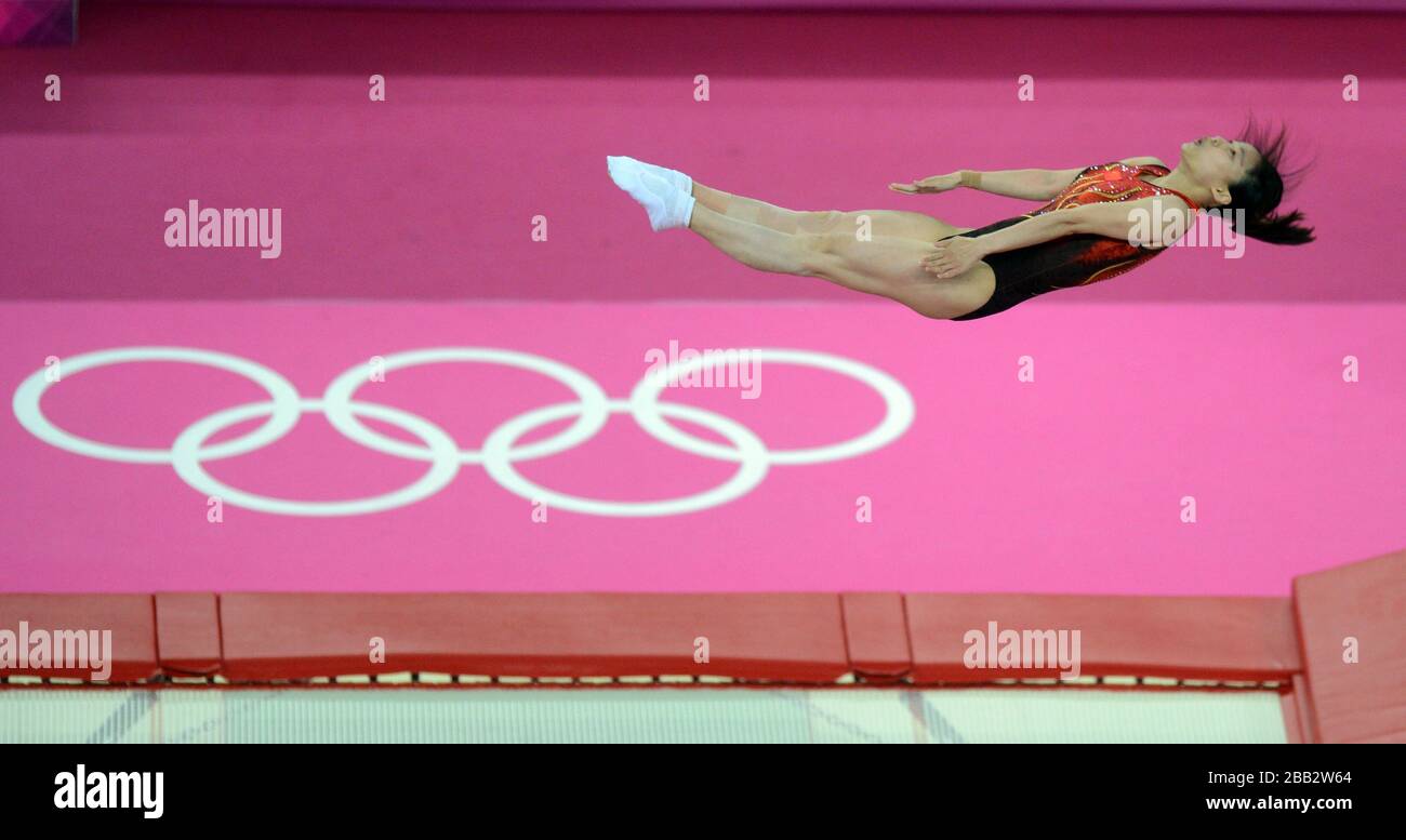 China's Shanshan Huang competes competes during the Women's Tramolining ...