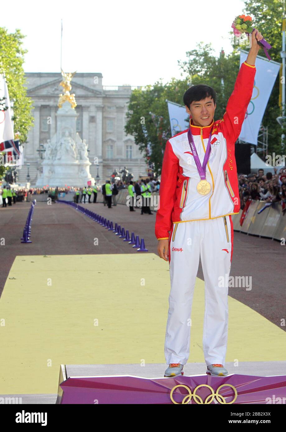 China's Ding Chen wins the gold medal in the Men's 20km Race Walk on ...