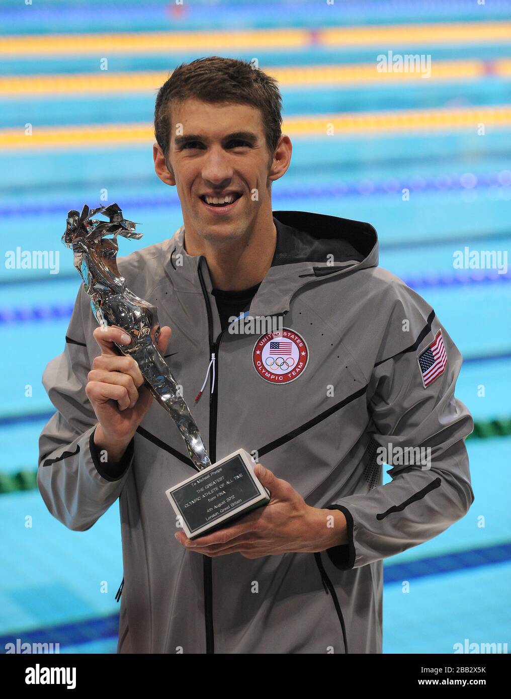 USA's Michael Phelps with his award for "The Greatest Olympic Athlete ...