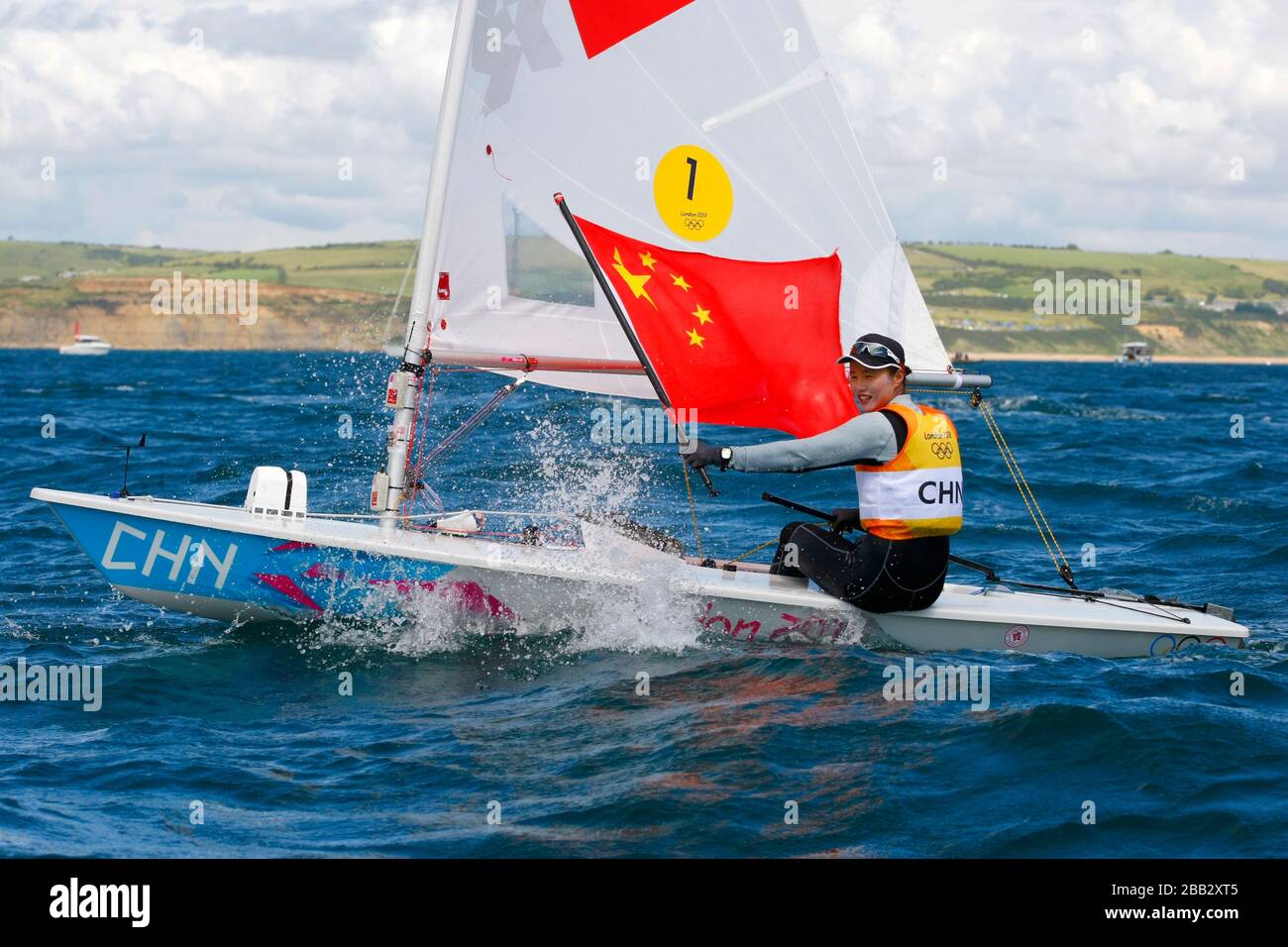 China's Lijia Xu celebrates her victory in the Women's Laser Radial ...
