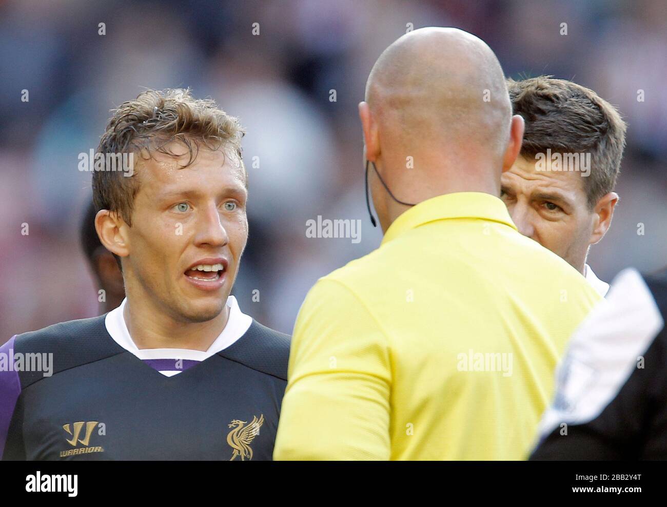 Liverpool's Lucas (left) and Steven Gerrard (right) appeal to Referee ...