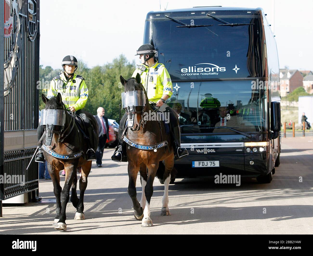 Mounted Police at the stadium gates Stock Photo - Alamy