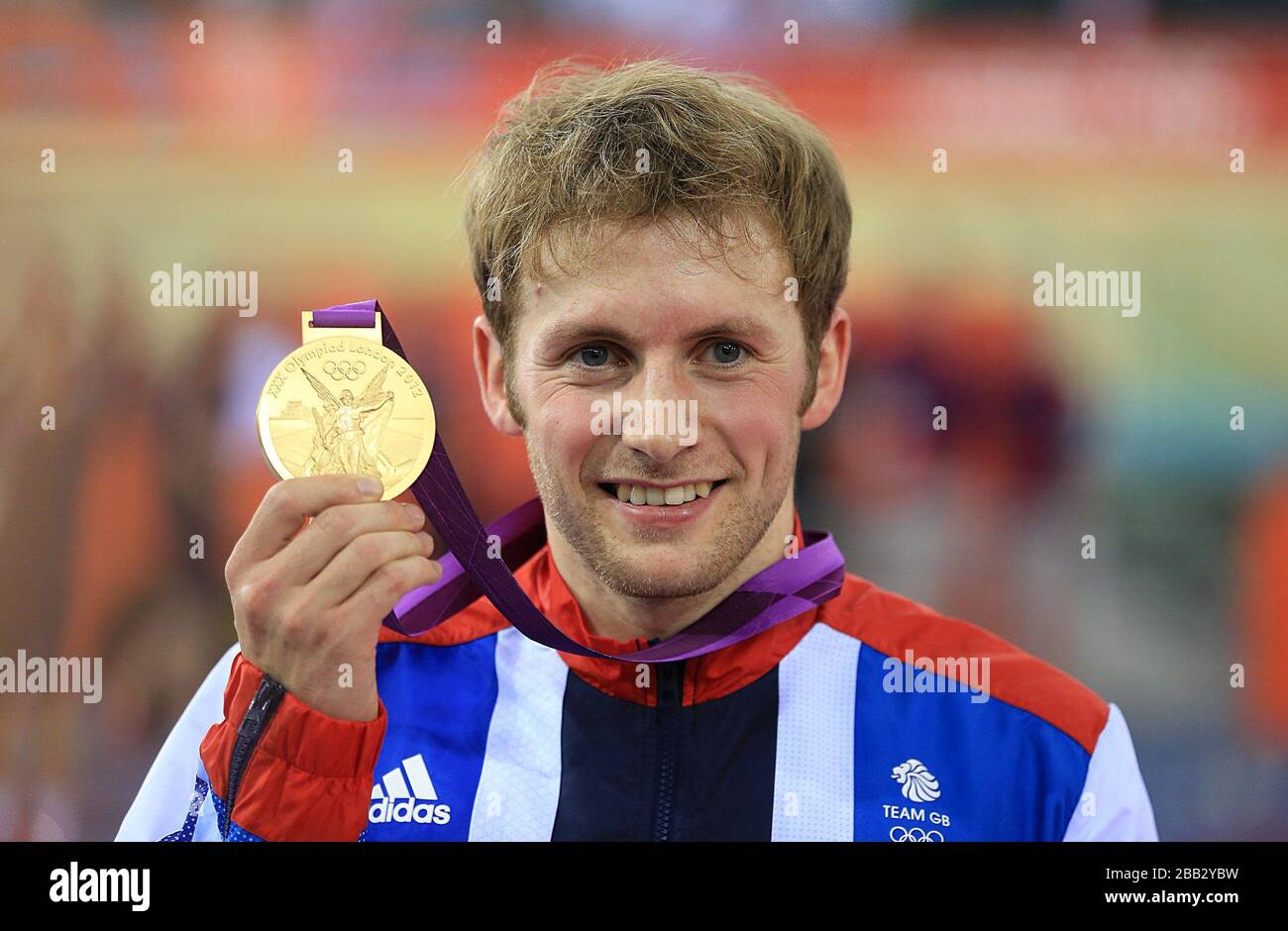 Great Britain's Jason Kenny celebrates with his gold medal after ...