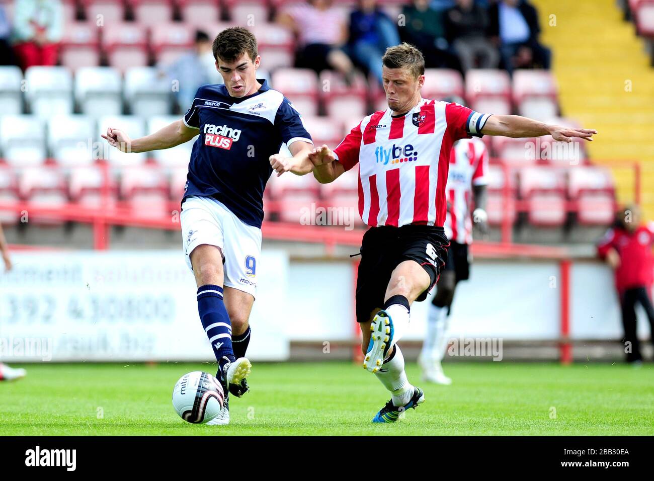 Exeter City's Danny Coles and Millwall's John Marquis (left Stock Photo ...
