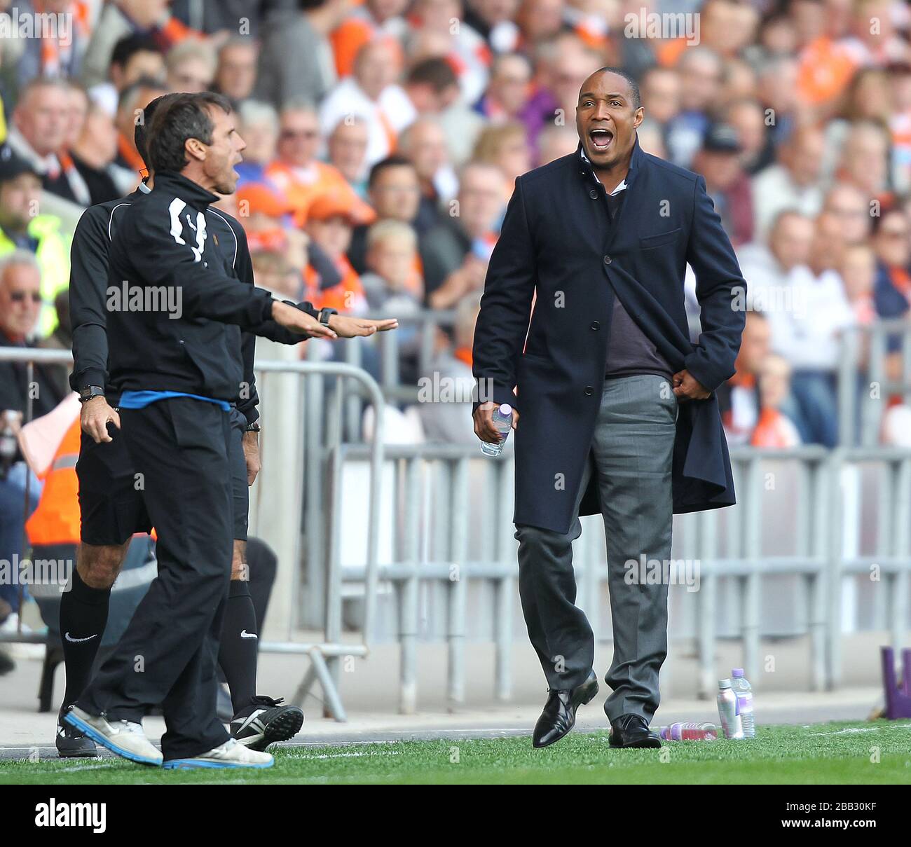 Blackpool's manager Paul Ince shouts instructions to his team from the ...