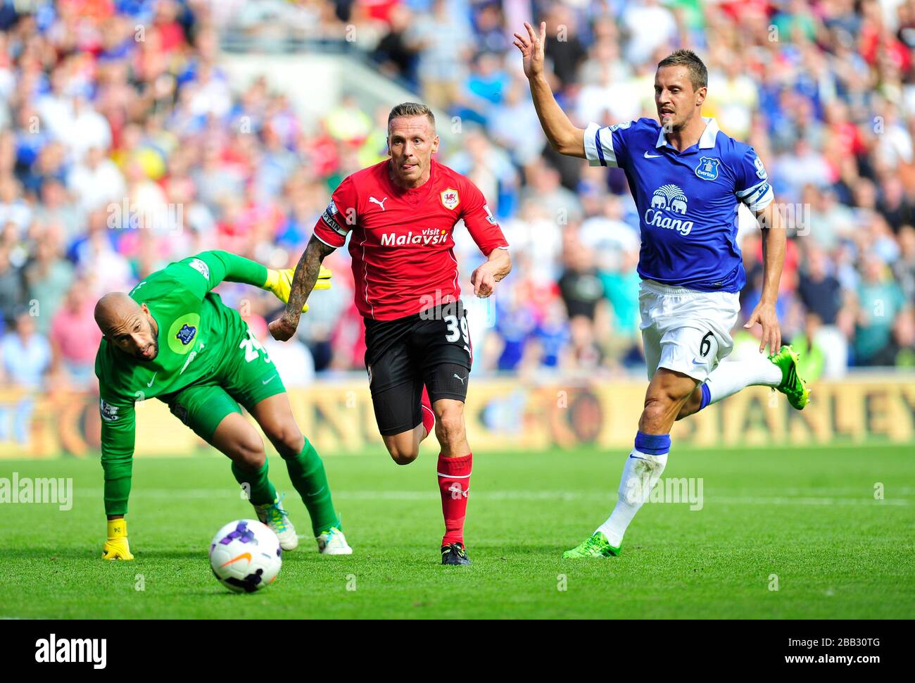 Cardiff City's Craig Bellamy and Everton goalkeeper Tim Howard and Phil ...