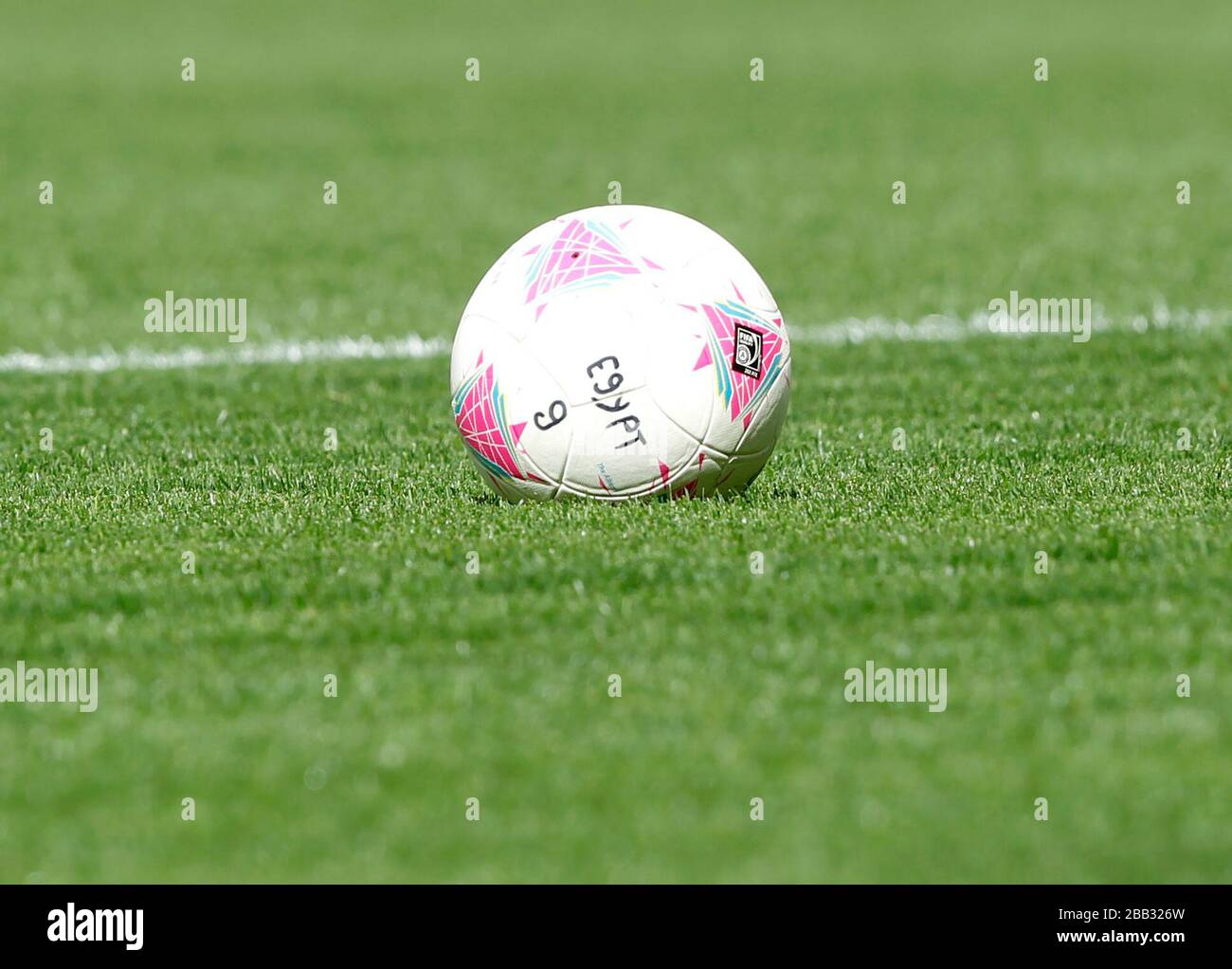 Match day ball on the pitch Stock Photo - Alamy