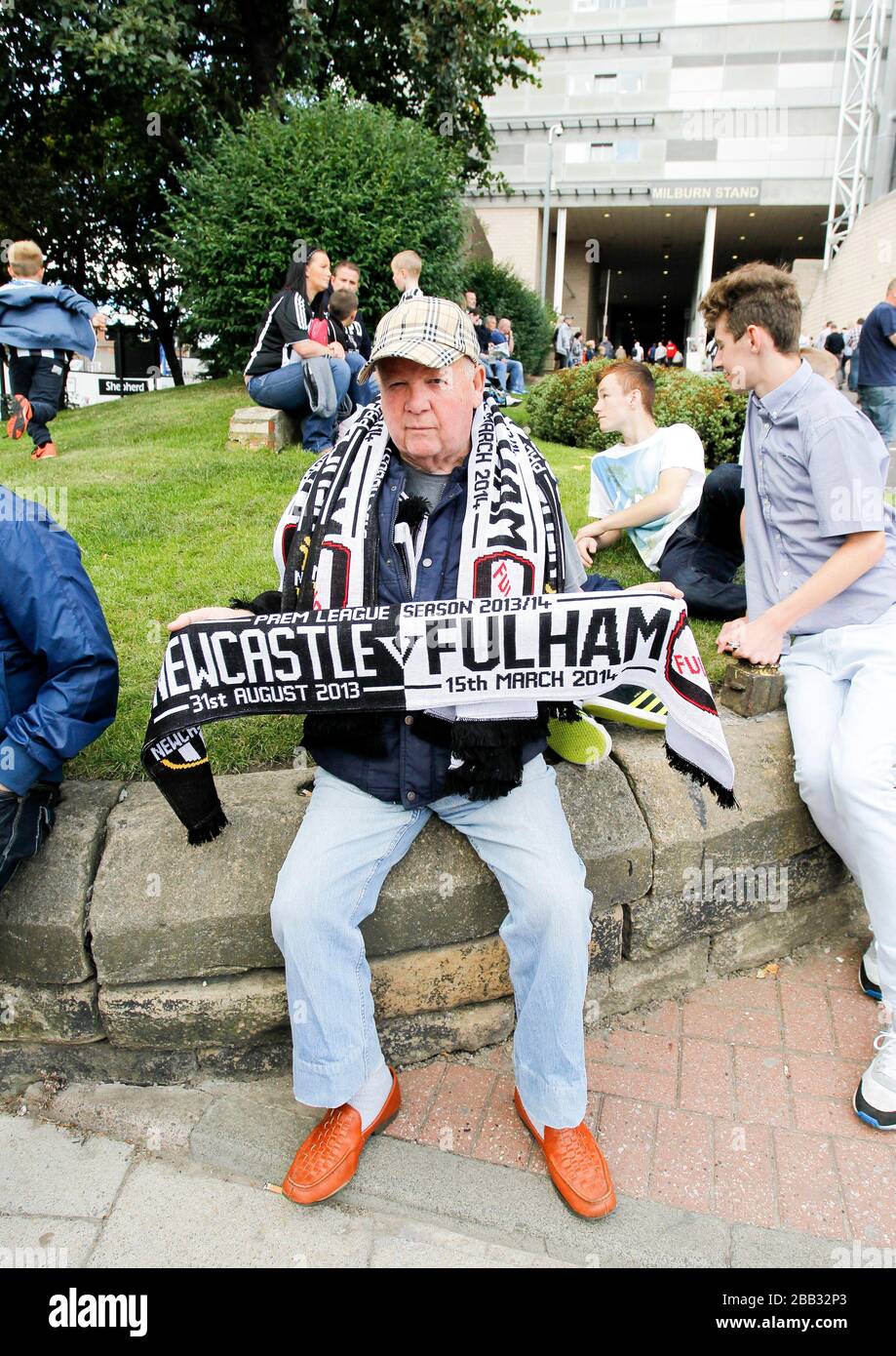 Fans outside the stadium before the match Stock Photo - Alamy