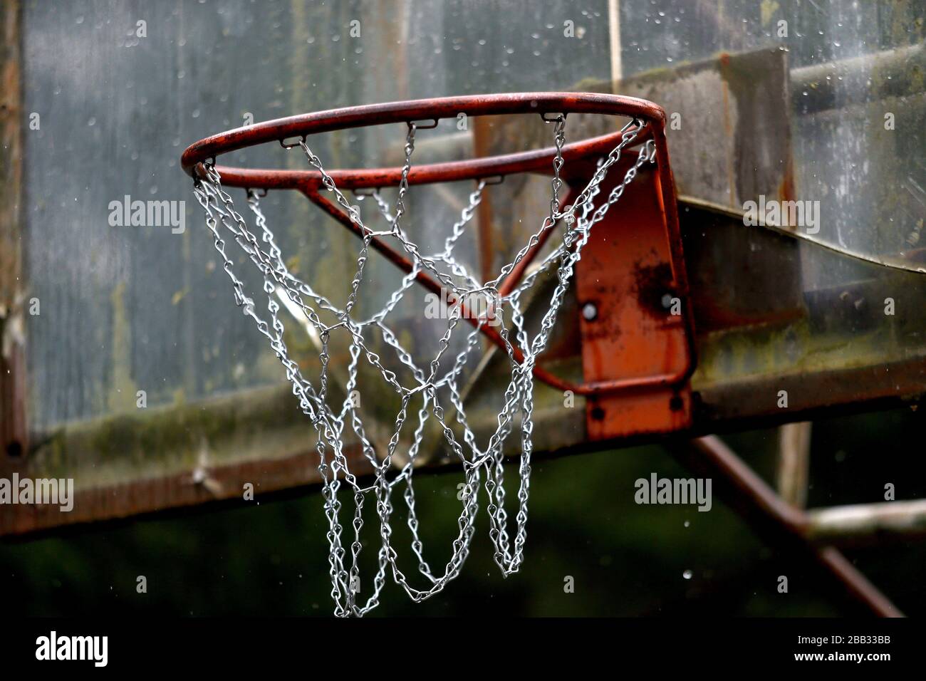Outdoor basketball hoop and board damaged. It rains Stock Photo - Alamy
