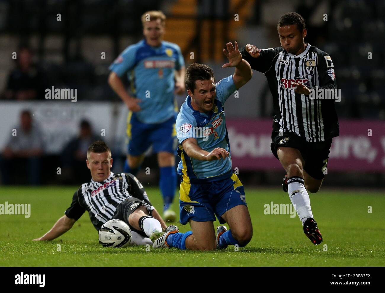 Notts County's Callum McGregor (left) and Curtis Thompson and Burton ...