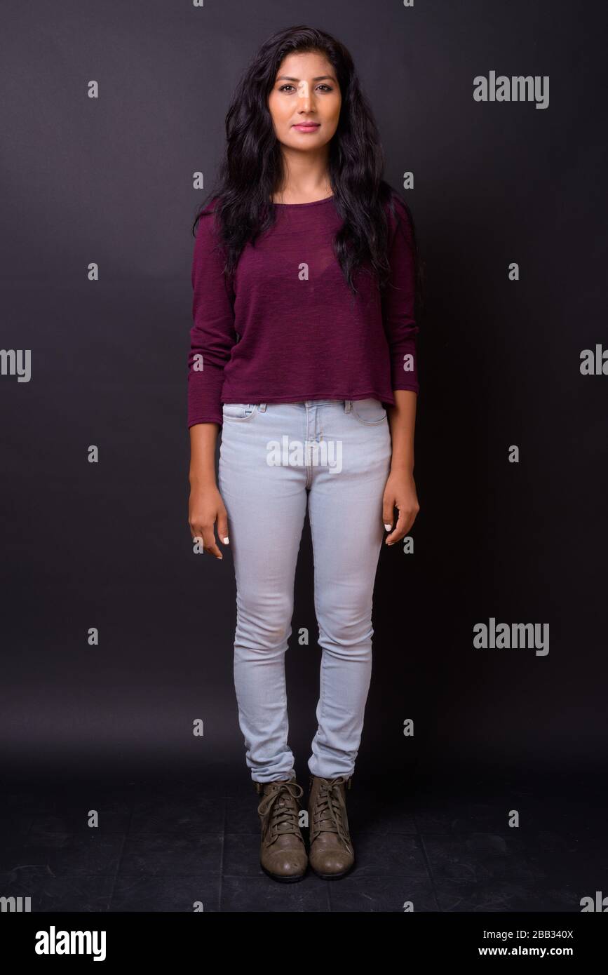 Full body shot of young beautiful Indian woman Stock Photo - Alamy