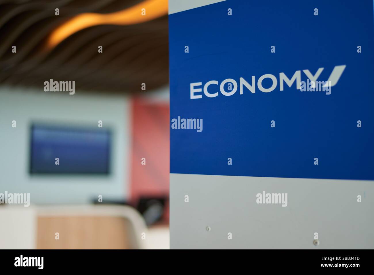 Paris Airport - Circa July 2019: Economy class sign on a check-in in ...