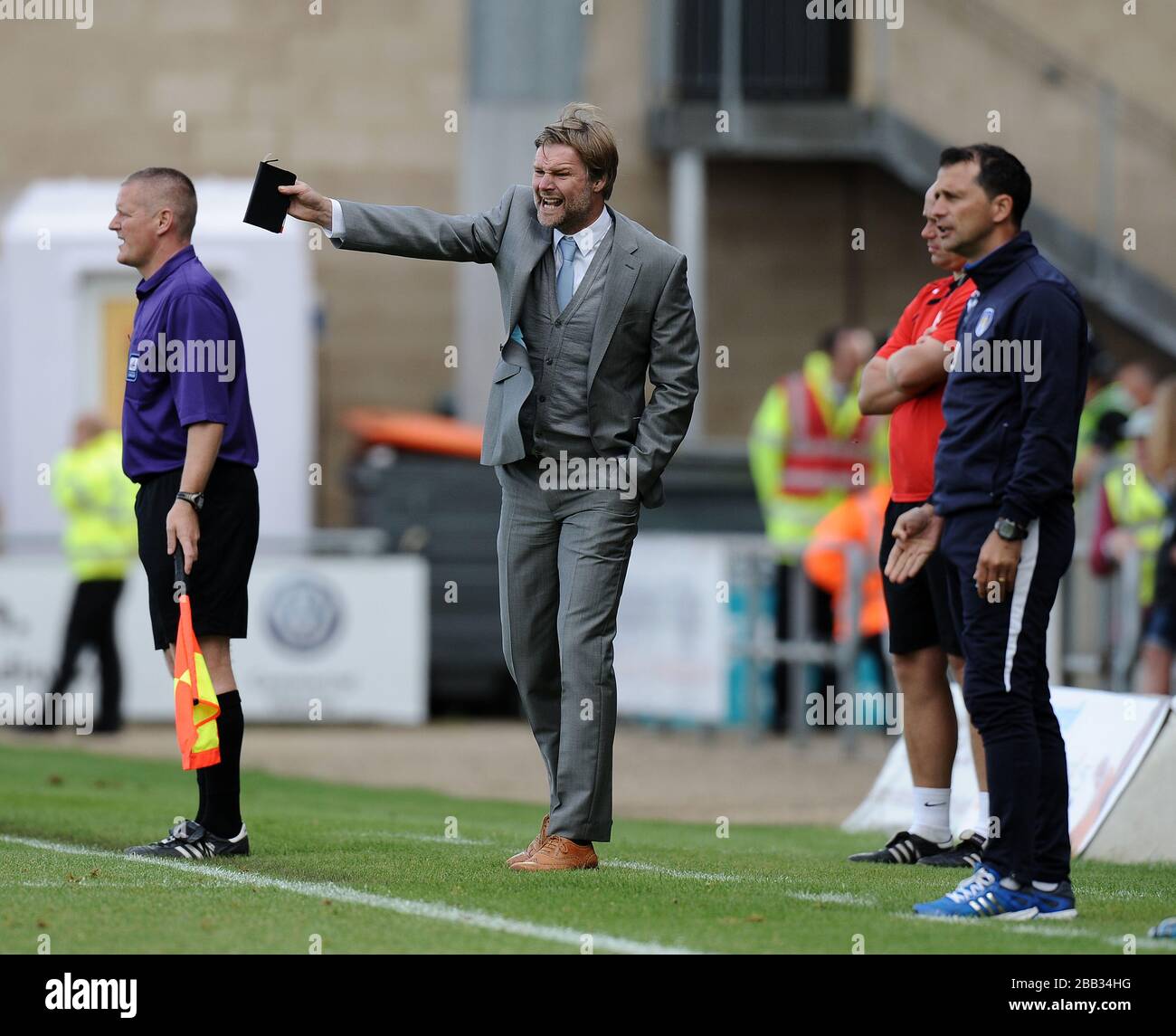 Coventry City's manager Steven Pressley shouts his instructions on the ...