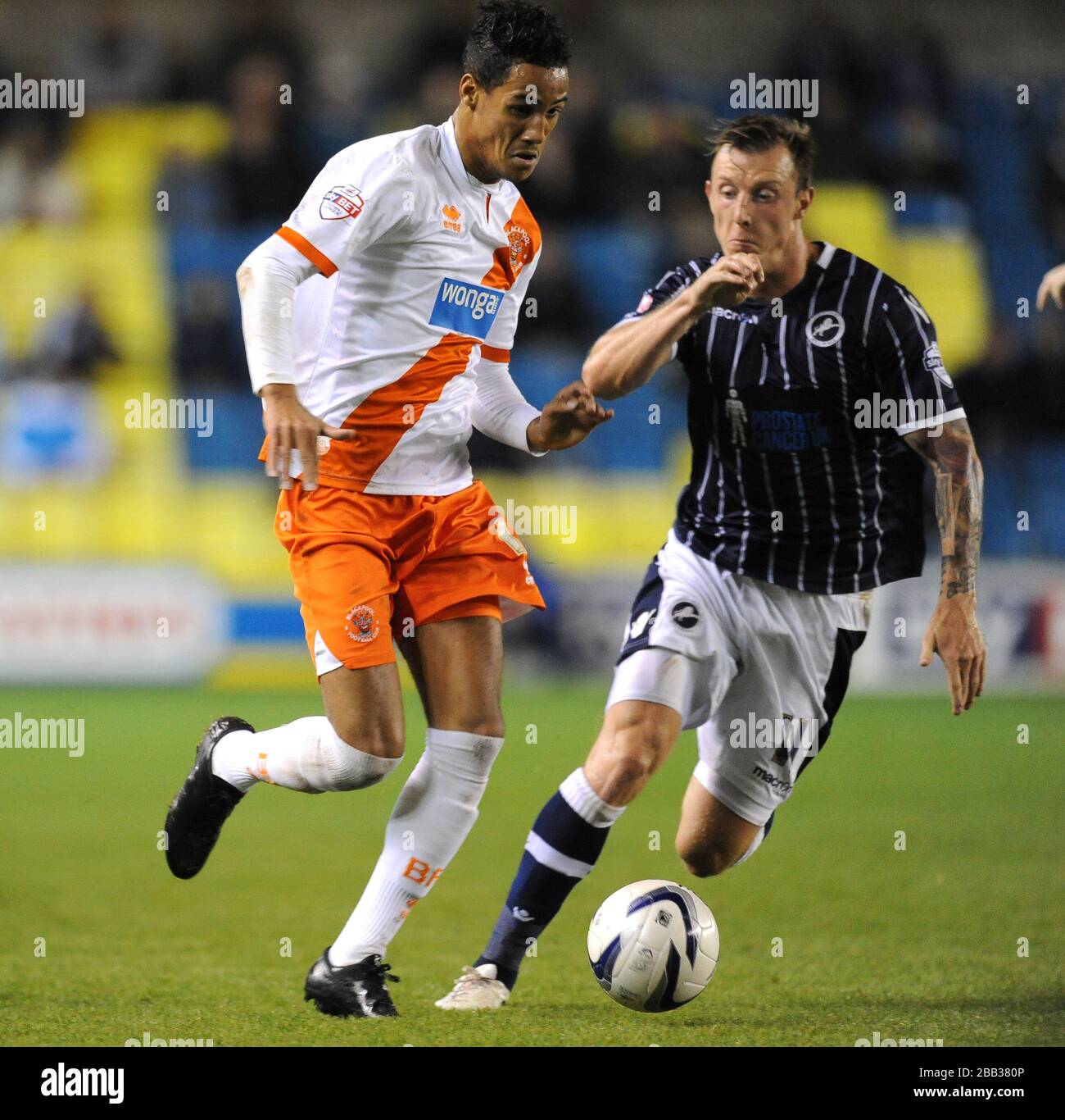Millwall's Martyn Woolford (right) and Blackpool's Thomas Ince (left ...