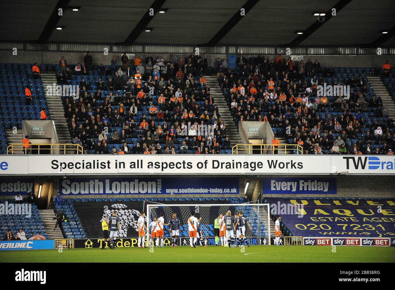 Blackpool fans in the stands at The Den Stock Photo - Alamy