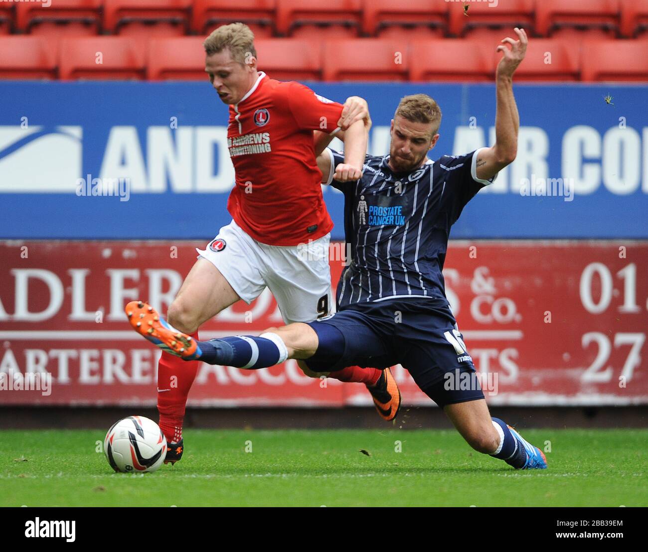 Charlton Athletic's Simon Church (left) and Millwall's Mark Beevers in ...