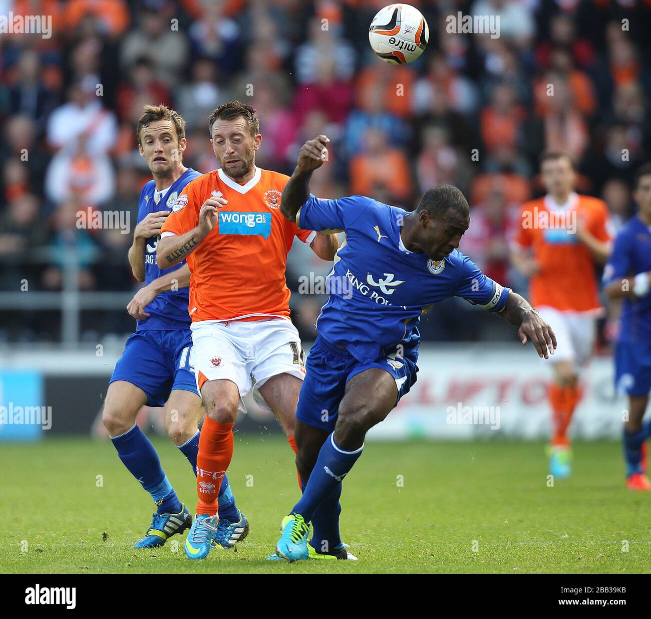 Blackpool's Stephen Dobbie and Leicester City's Wes Morgan Stock Photo ...