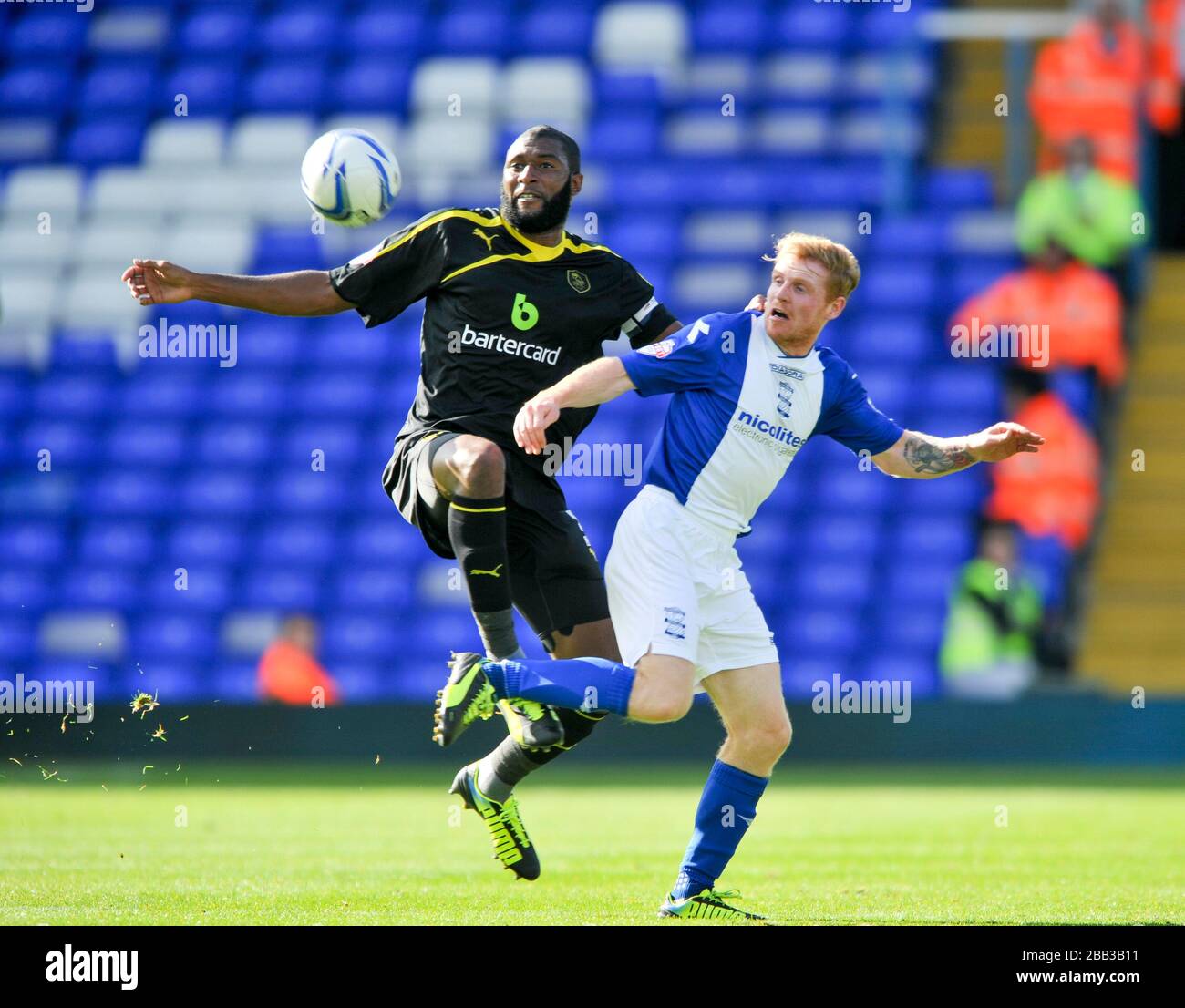 Sheffield Wednesday's Reda Johnson and Birmingham City's Chris Burke ...