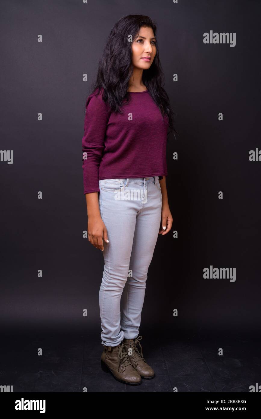 Full body shot of young beautiful Indian woman Stock Photo - Alamy