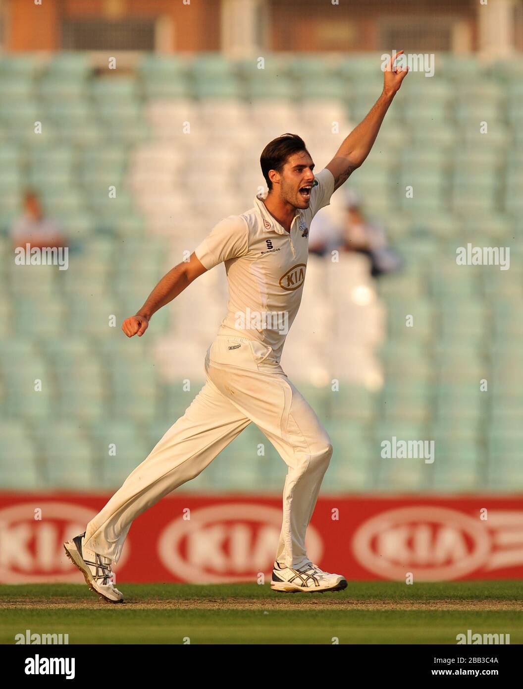Surrey's Tom Jewell celebrates taking the wicket of Yorkshire's Andrew ...