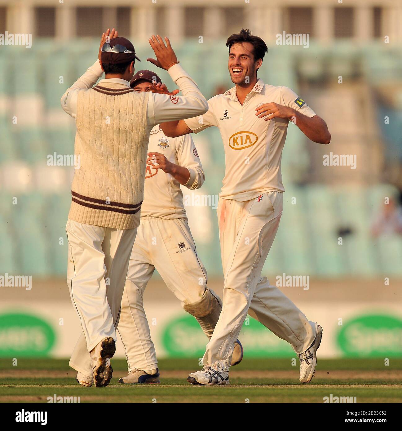Surrey's Tom Jewell (right) celebrates with his team mate Vikram ...