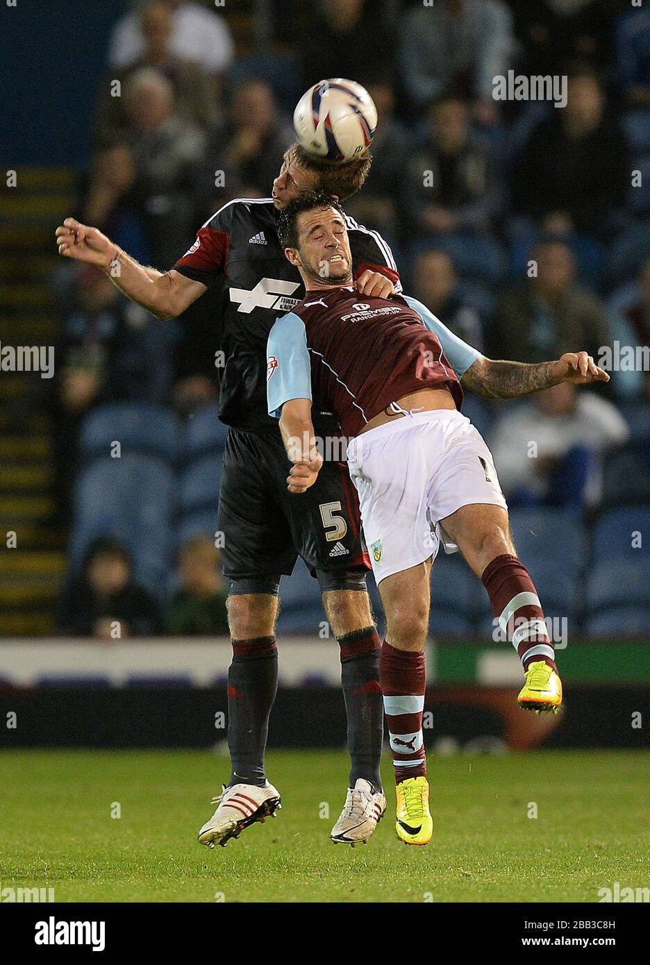 Burnley's Danny Ings battles for the ball with Nottingham Forest's ...