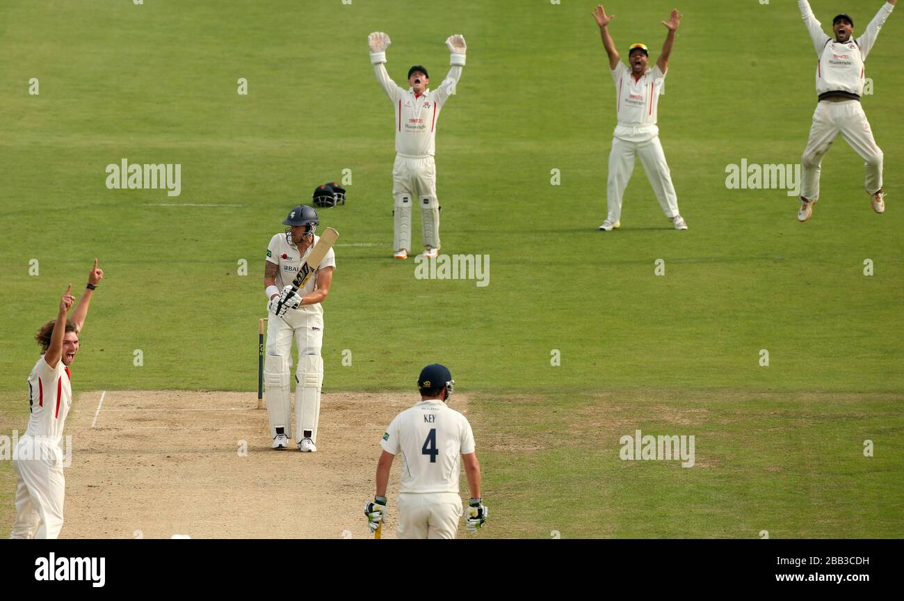 Kent's Ben Harmison (centre) is out lbw for 59 off the bowling of ...