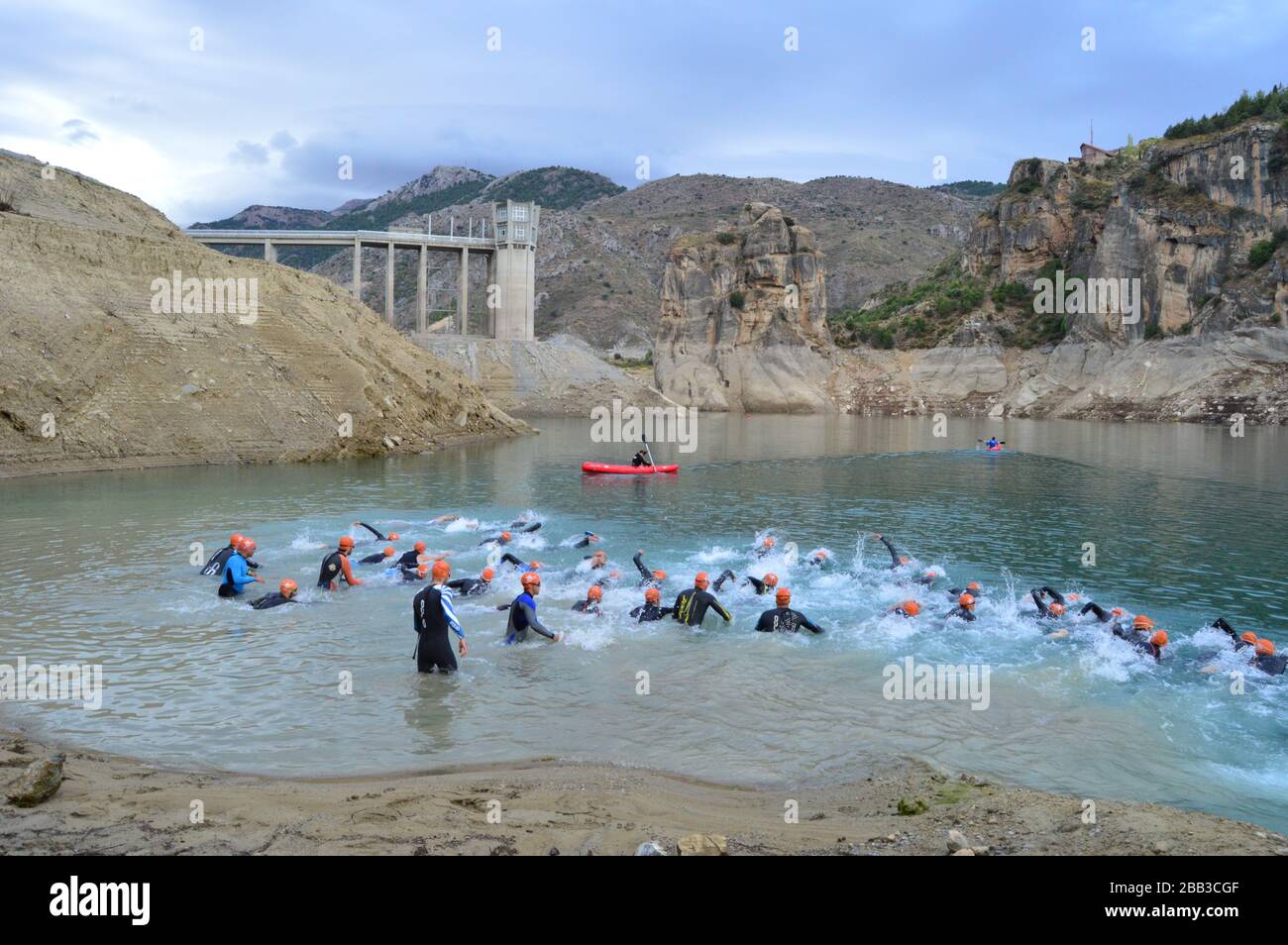 Triathletes starting the phase swimm in a triathlon trial, Canales ...