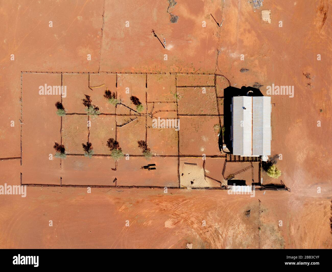 Aerial of agricultural shed and yards on Devoise Station near Eulo ...