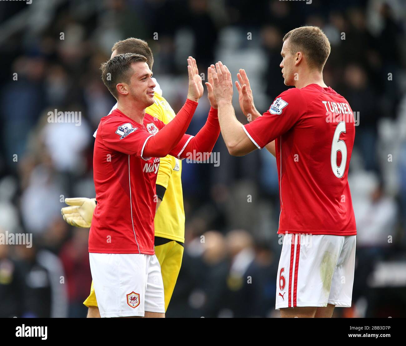 Cardiff City's Ben Turner (right) and Andrew Taylor greet each other ...