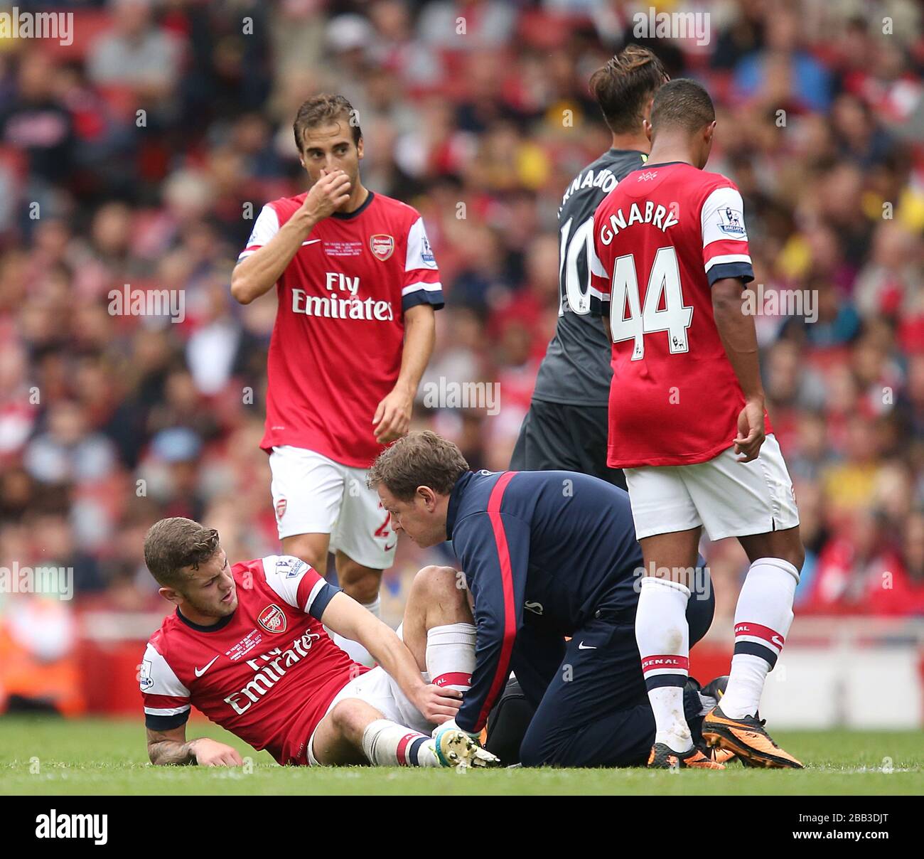 Arsenal's Jack Wilshere is treated for an injury Stock Photo - Alamy